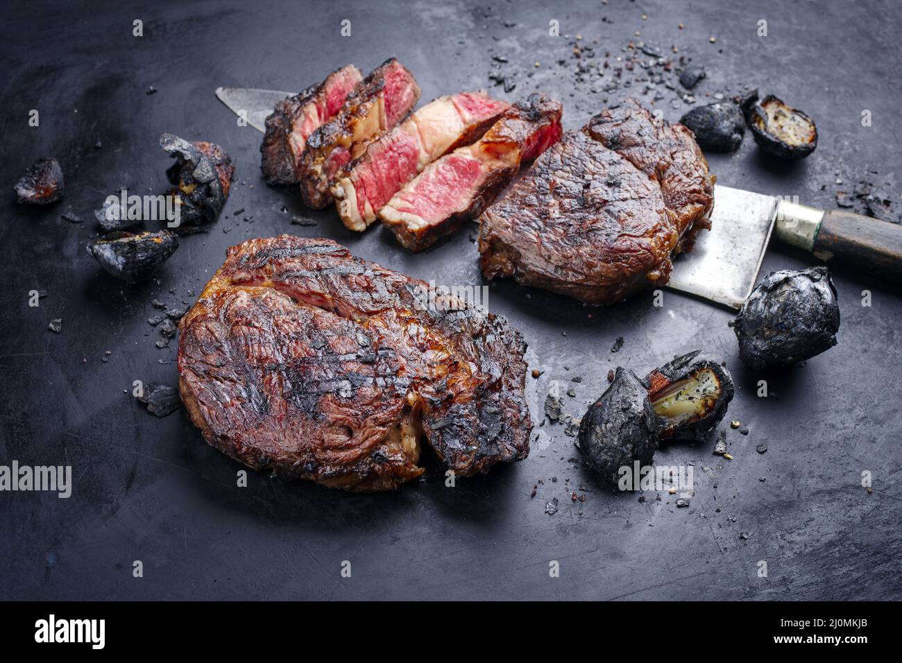 Traditional barbecue dry aged wagyu rib-eye beef steaks with charred ...