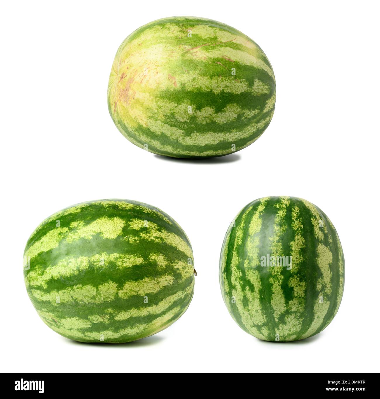 Whole ripe round striped watermelon with yellow side isolated on white ...