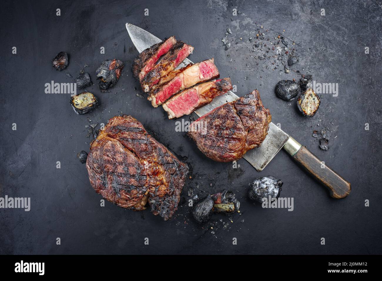Traditional barbecue dry aged wagyu rib-eye beef steaks with charred ...