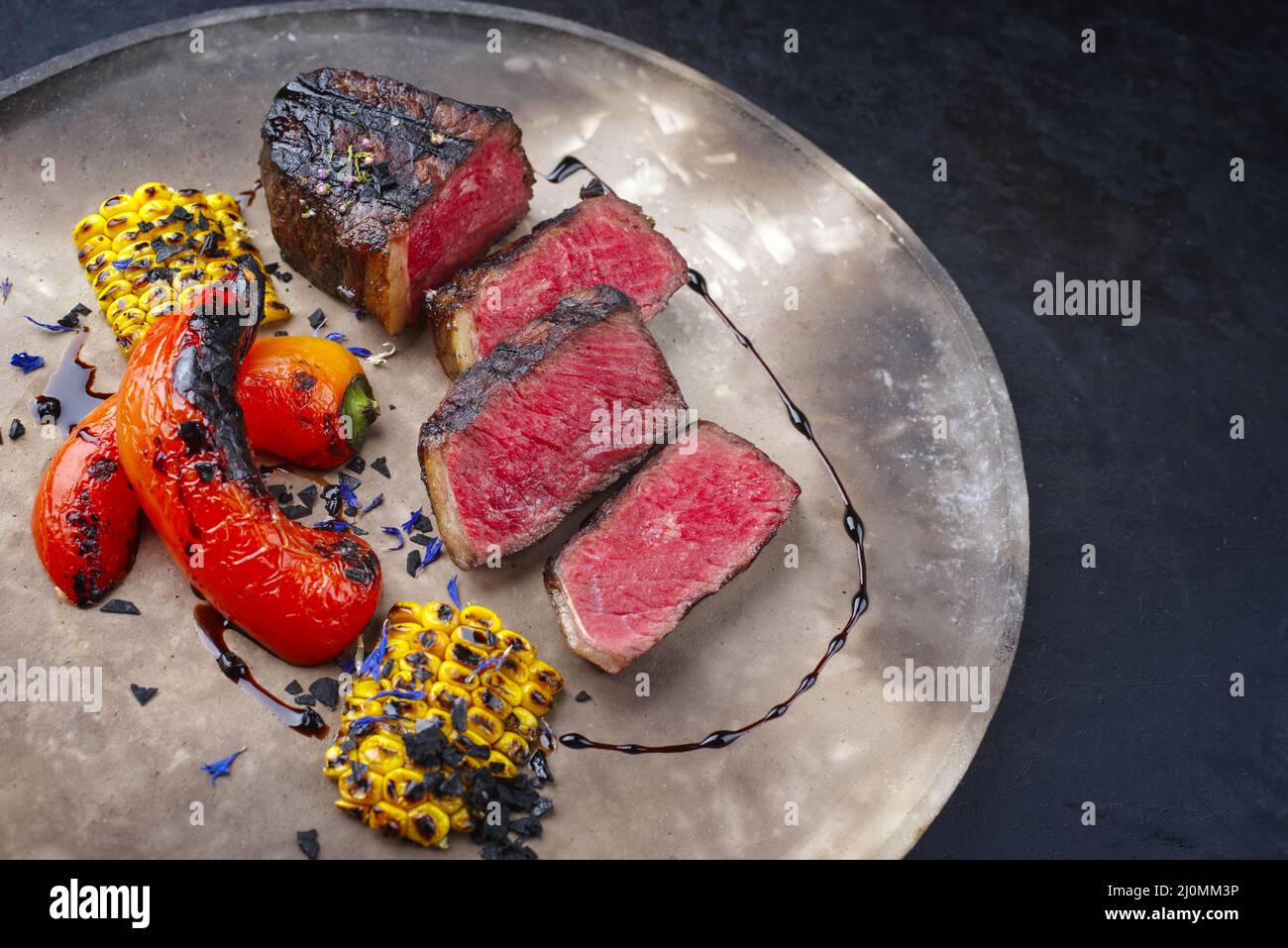 Rustic style barbecue dry aged wagyu roast beef steak with paprika and ...