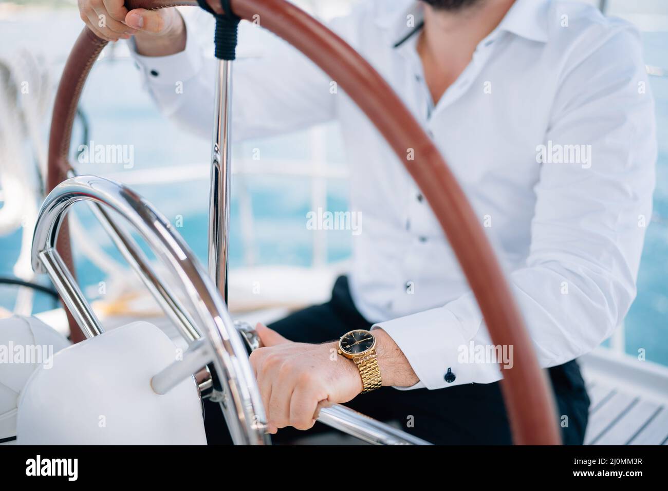 Ship hands steering wheel hi-res stock photography and images - Alamy