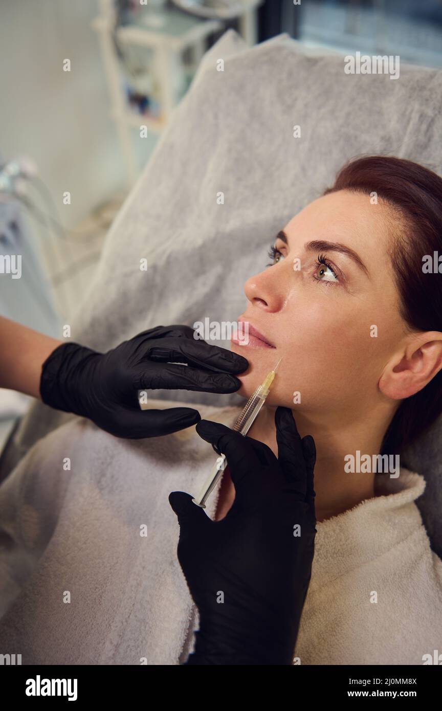 Botulinum toxin injections middle aged hi-res stock photography and ...