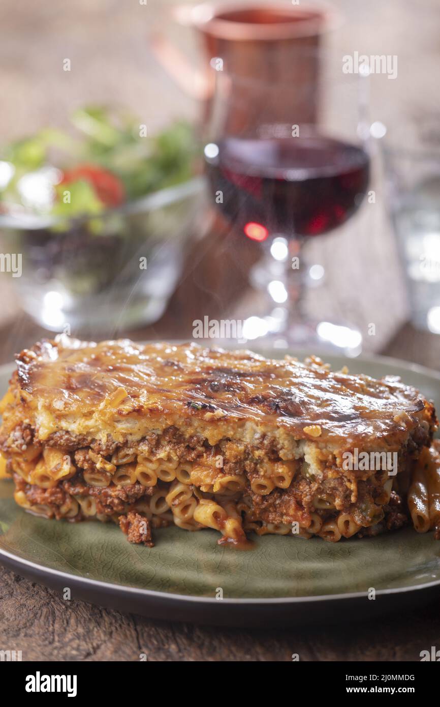 Greek pastizio pasta dish with cheese Stock Photo - Alamy