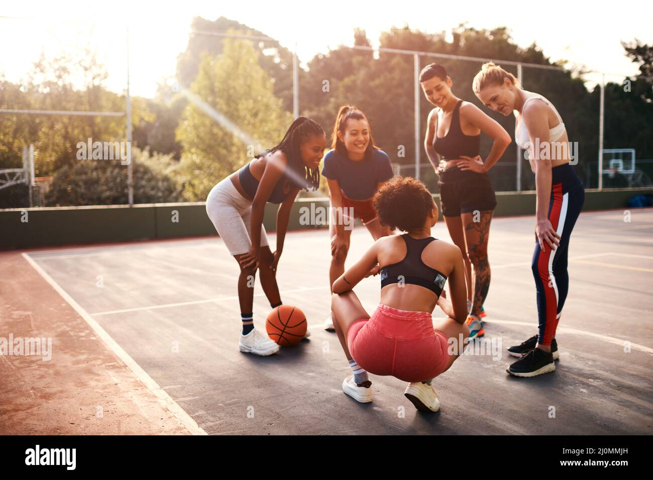 Happy diverse female basketball team hi-res stock photography and ...
