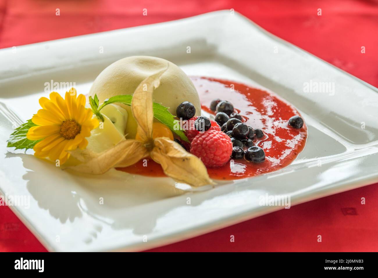 Delicious passion fruit parfait with strawberry sauce - dessert Stock ...