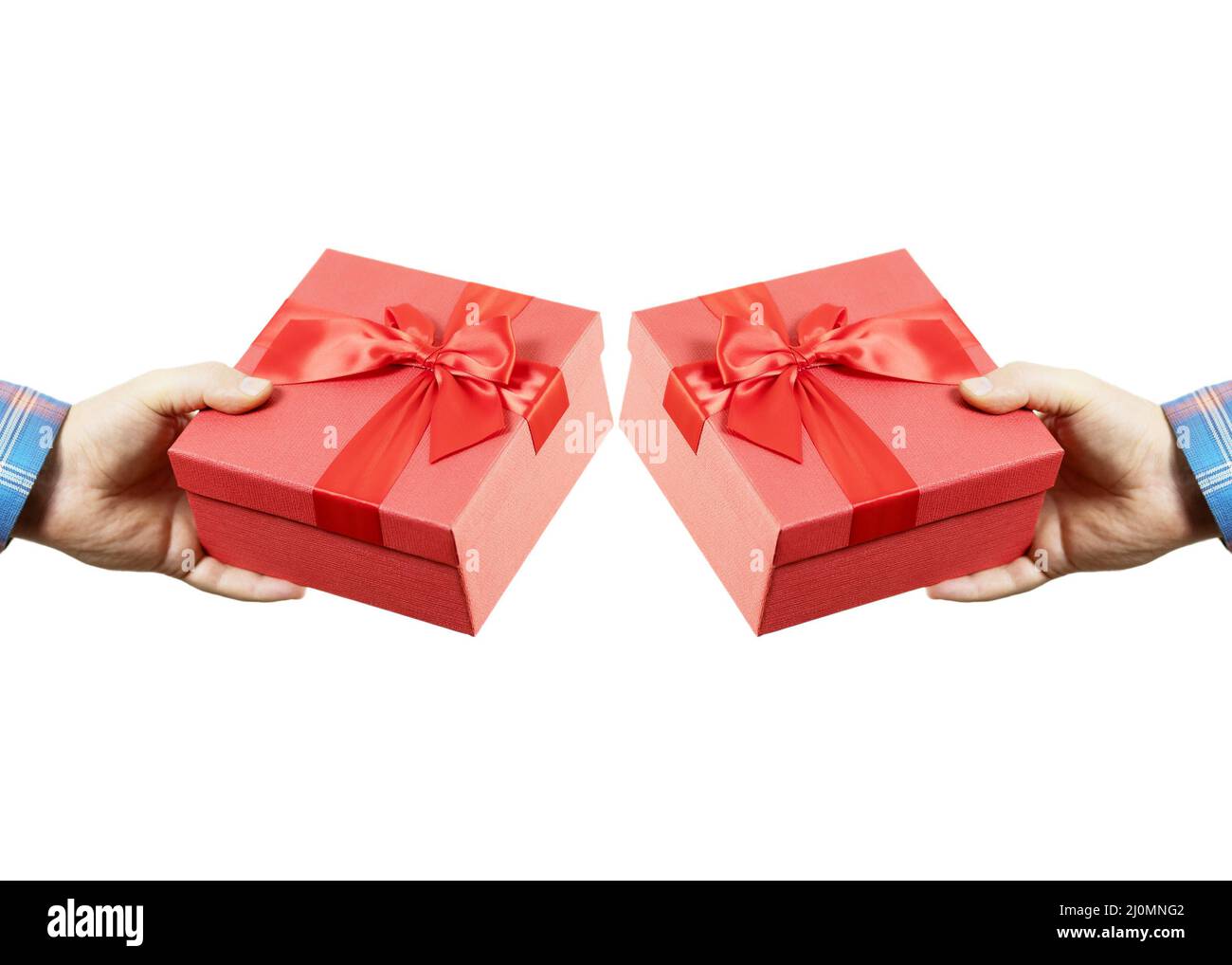 Hand is holding a gift box with a red ribbon hi-res stock photography ...