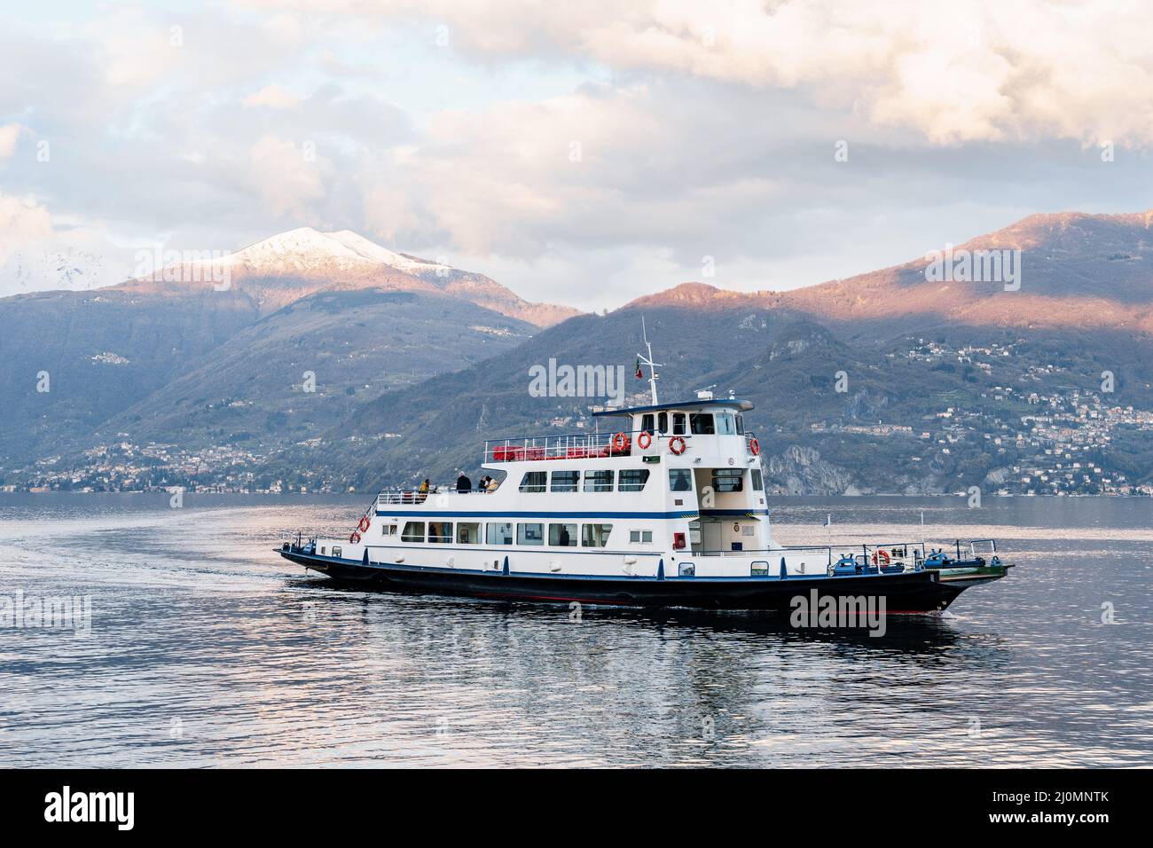 Passenger ferry sails past the Italian coast. Lake Como Stock Photo - Alamy