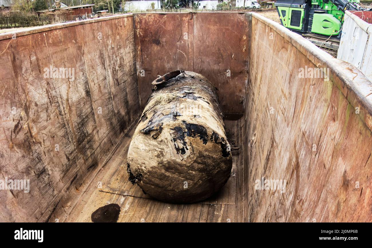 Soil tank excavated during soil remediation is temporarily stored in an ...