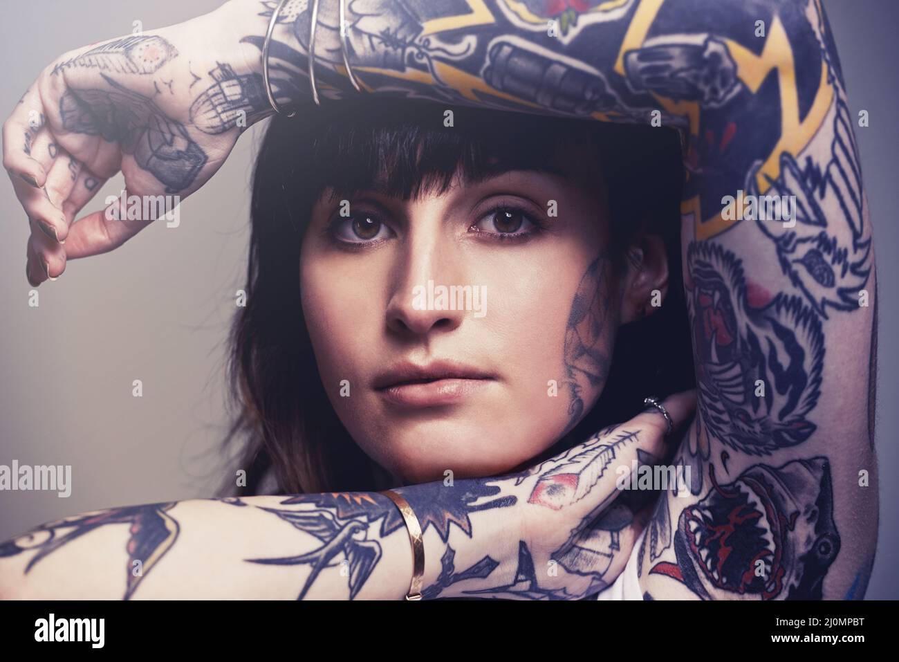 Women face tattoo hi-res stock photography and images - Alamy