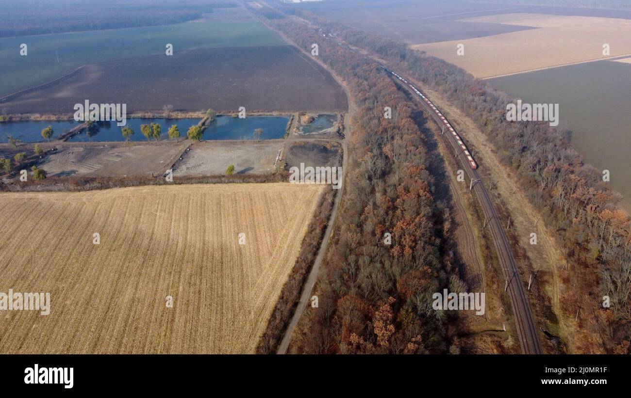 Panoramic Moving Freight Train Along Railway Tracks, Trees Agricultural ...