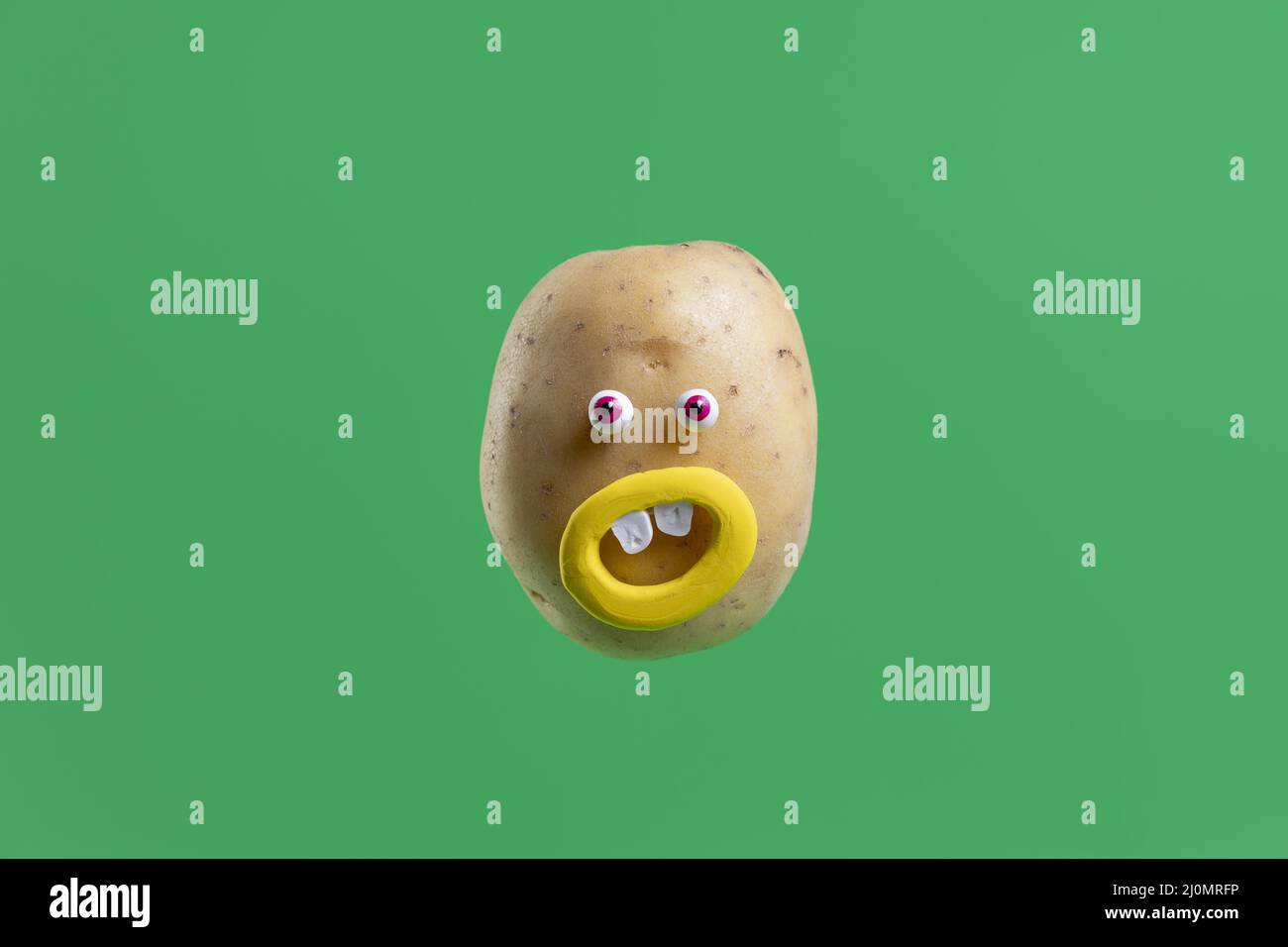 Funny potato with face sticker Stock Photo - Alamy