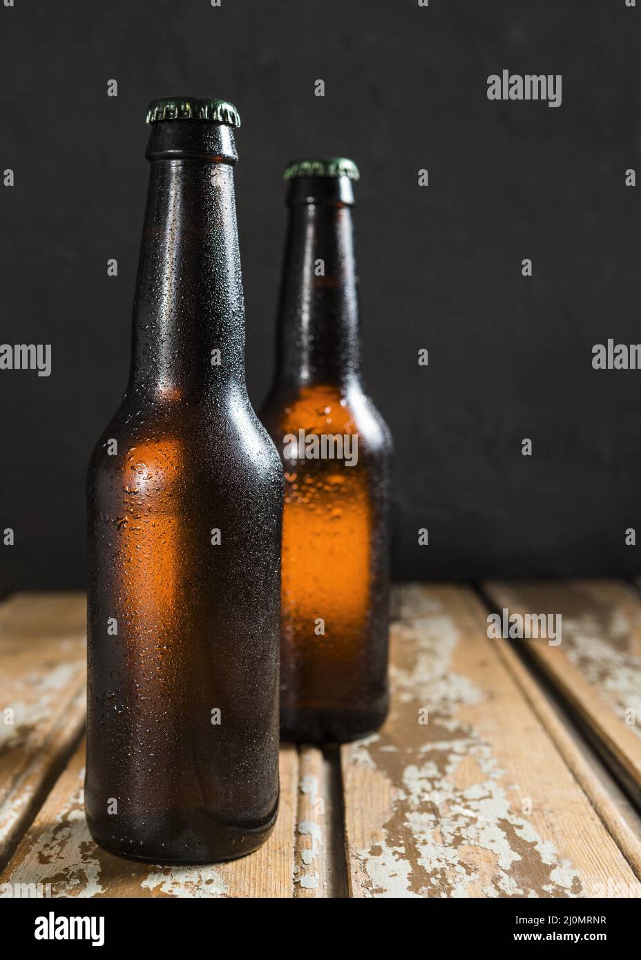 Front view beer glass bottles Stock Photo - Alamy