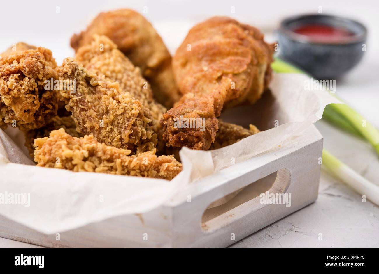 Front view fried chicken tray Stock Photo - Alamy