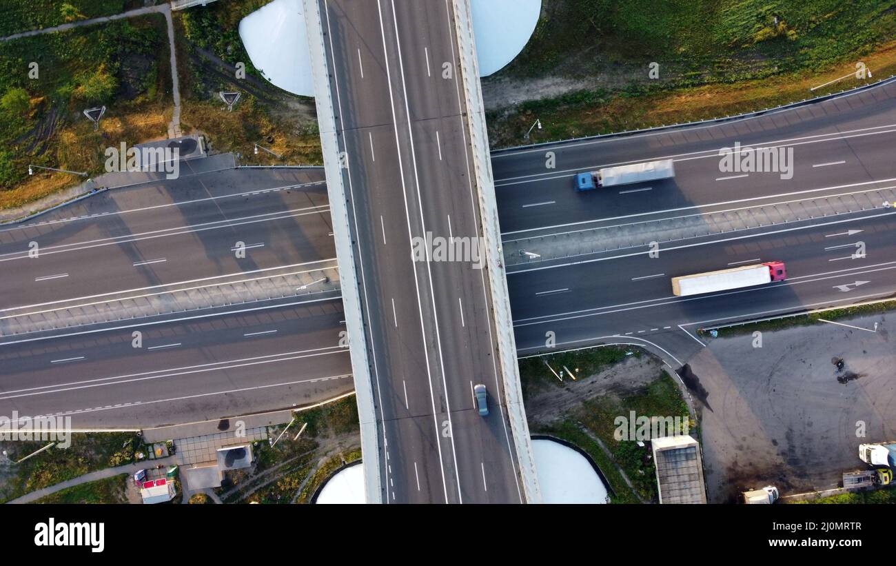 Cars go along the road asphalt bridge, junction. Top view Stock Photo ...