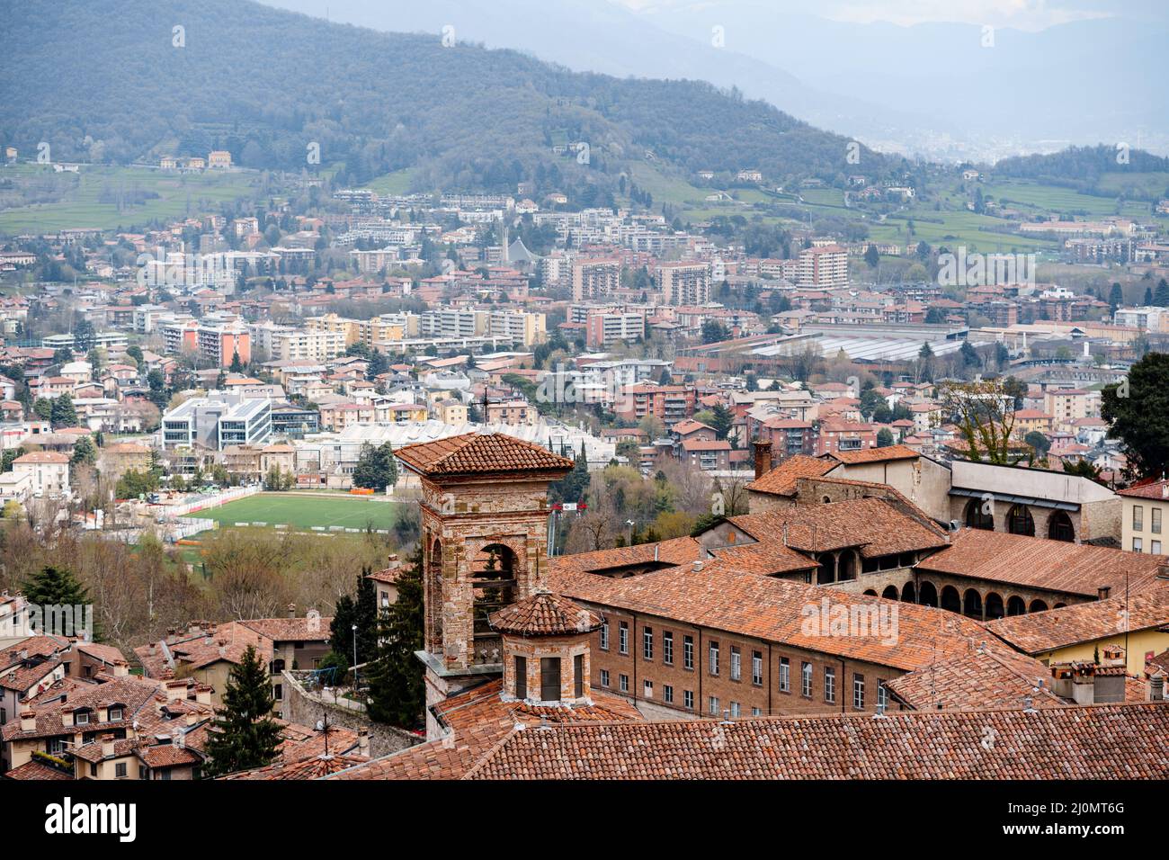 View of the new part of the city of Bergamo in a mountain valley Stock ...