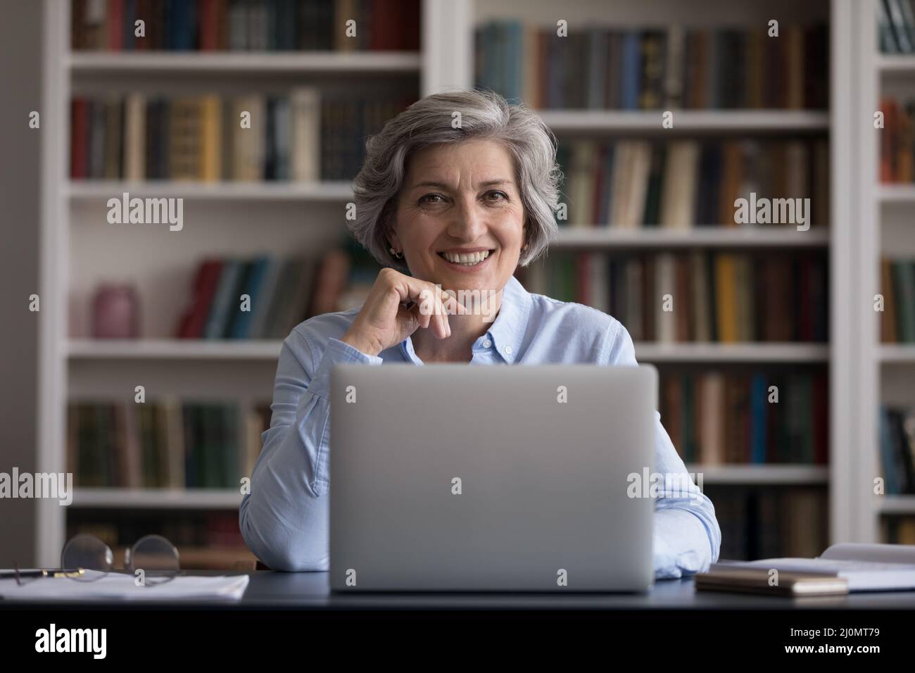 Old businesswoman laptop smiling camera hi-res stock photography and ...