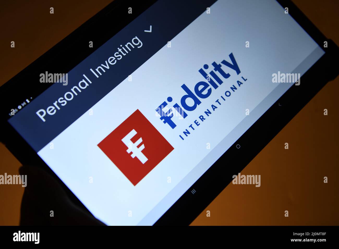The UK Website of Fidelity Invesments on a tablet Stock Photo - Alamy