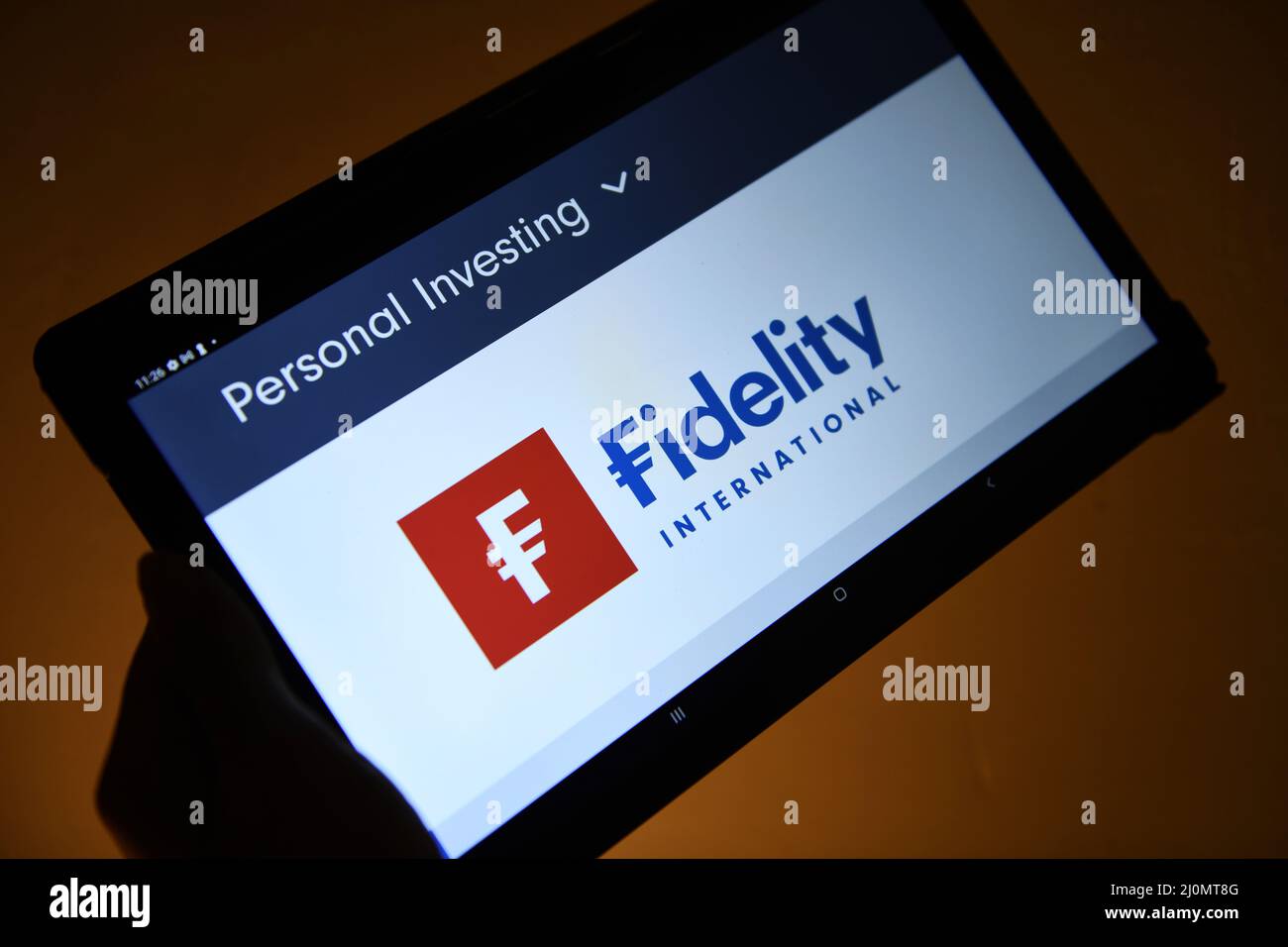 The UK Website of Fidelity Invesments on a tablet Stock Photo - Alamy