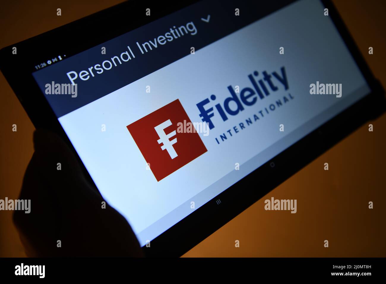 The UK Website of Fidelity Invesments on a tablet Stock Photo - Alamy