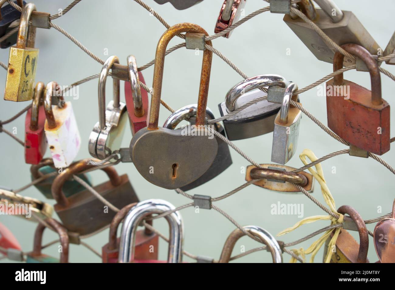 Love padlocks with heart shape. Concept of love. Metallic love padlock ...