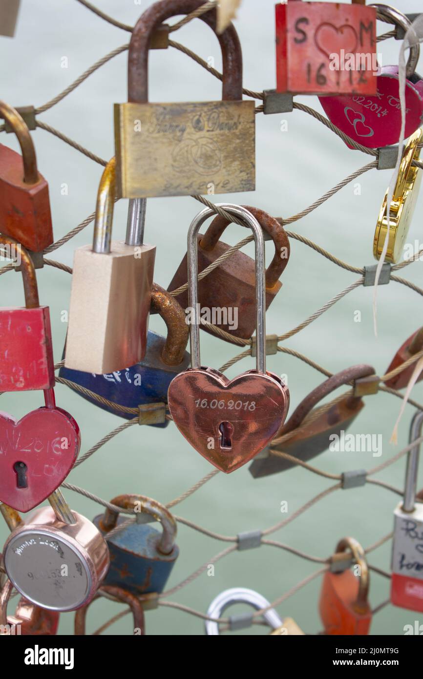 Love padlocks with heart shape. Concept of love. Metallic love padlock ...