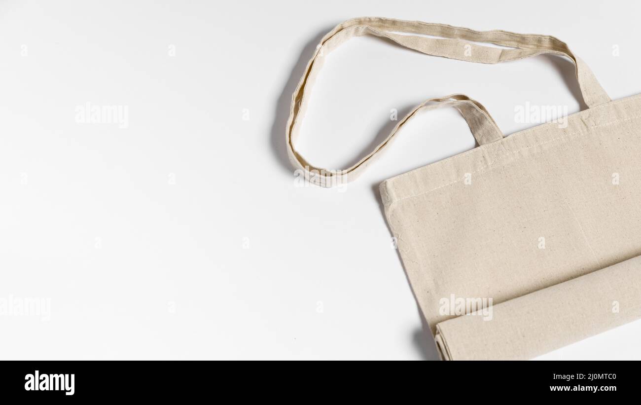 Folded fabric tote bag flat lay Stock Photo - Alamy