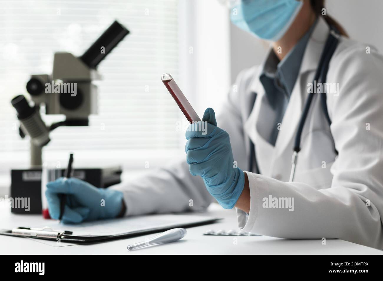 Doctor wearing face mask hospital Stock Photo - Alamy