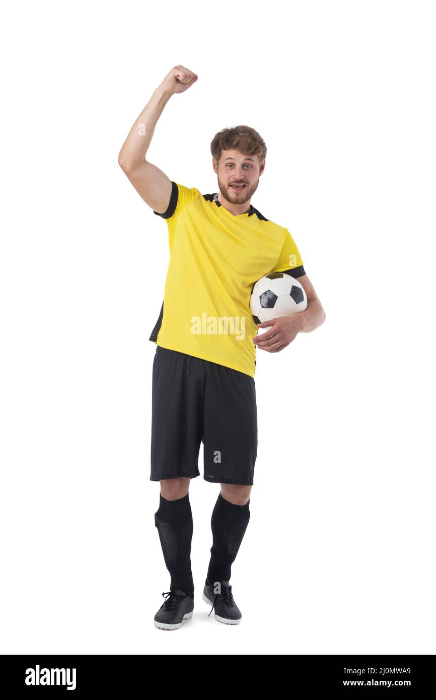 Full length portrait of a soccer player with ball isolated on white ...