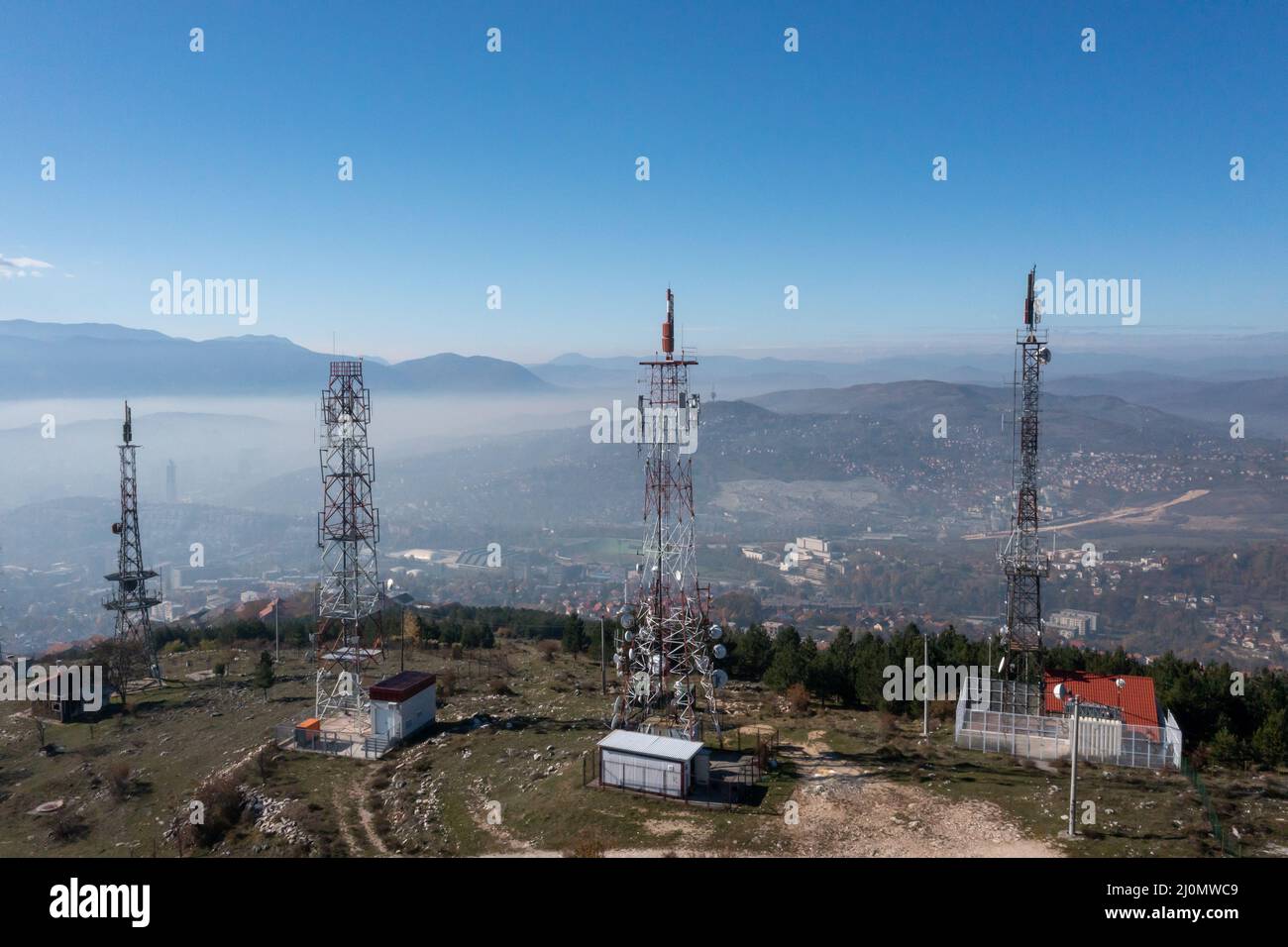 The telecom tower with blue sky. Telecommunications antenna tower in ...