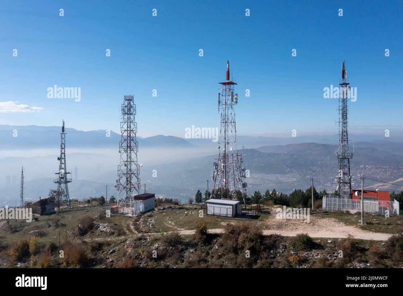 The telecom tower with blue sky. Telecommunications antenna tower in ...