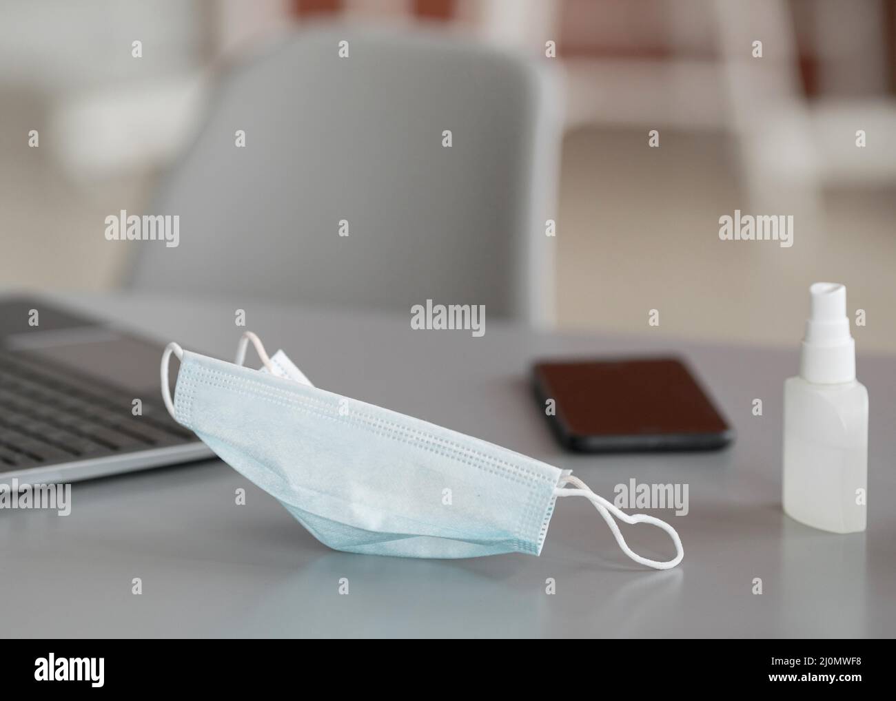 Close up face mask with disinfectant Stock Photo - Alamy