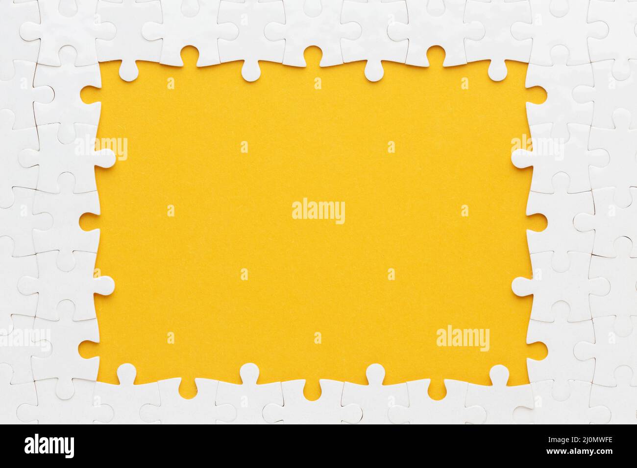Flat lay puzzle frame concept Stock Photo - Alamy