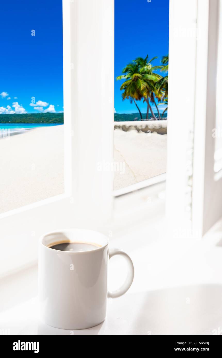 Cup of coffee on the window Stock Photo - Alamy