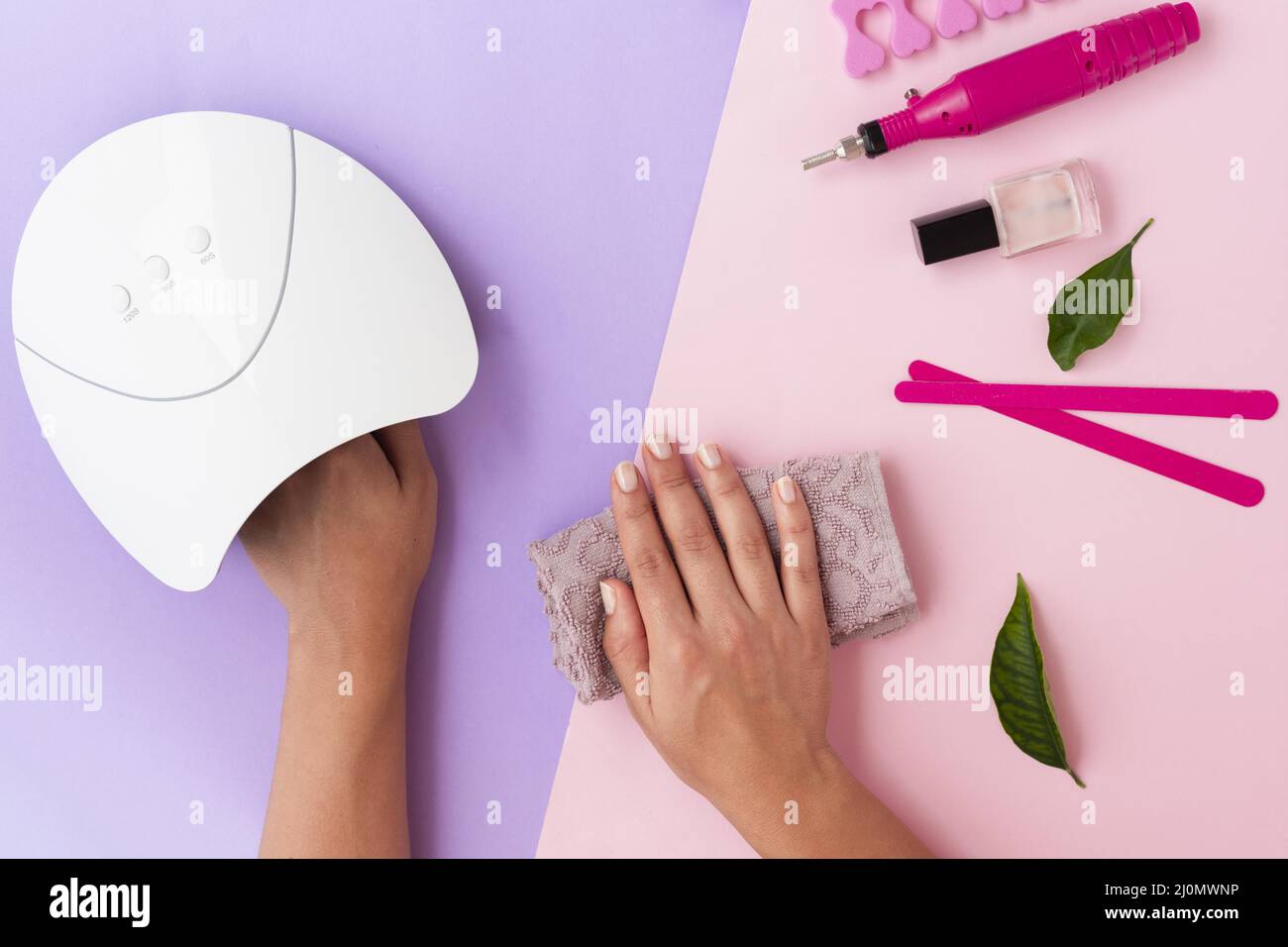 Woman doing nails office hi-res stock photography and images - Alamy