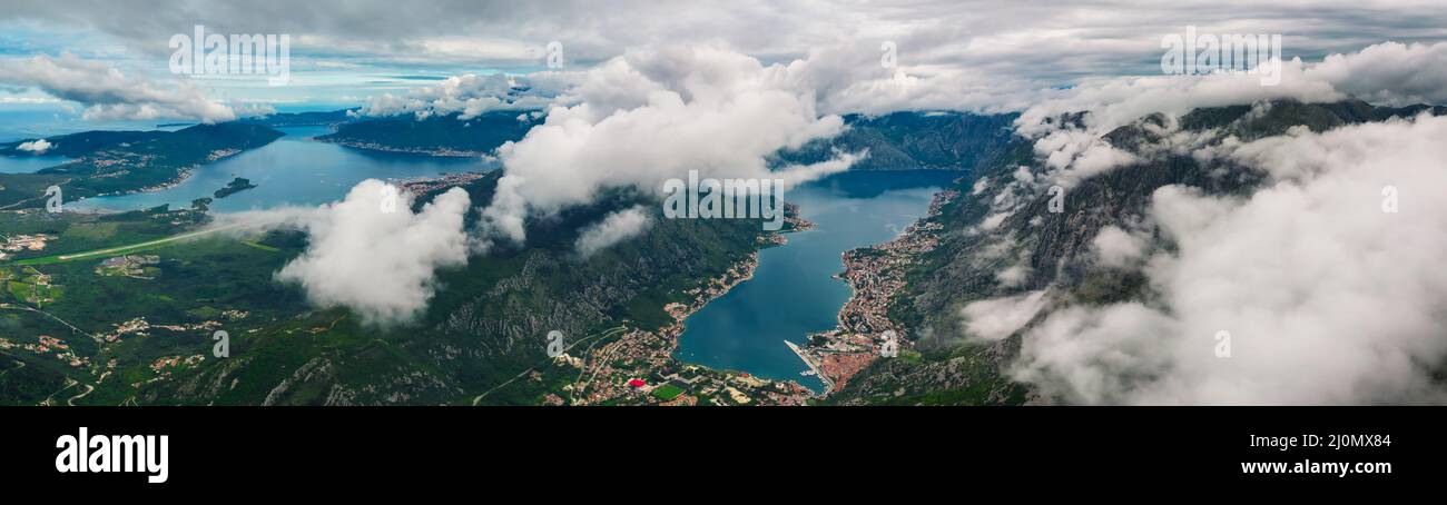 Aerial panoramic view of Kotor Bay from above the clouds, Montenegro ...