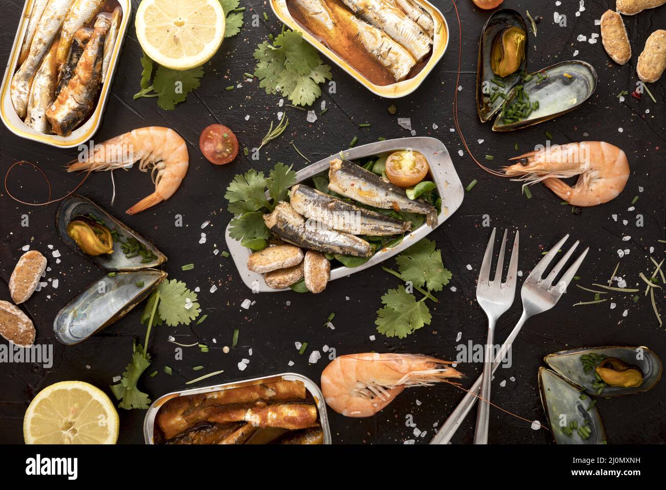 Flat lay assortment seafood with cutlery Stock Photo - Alamy