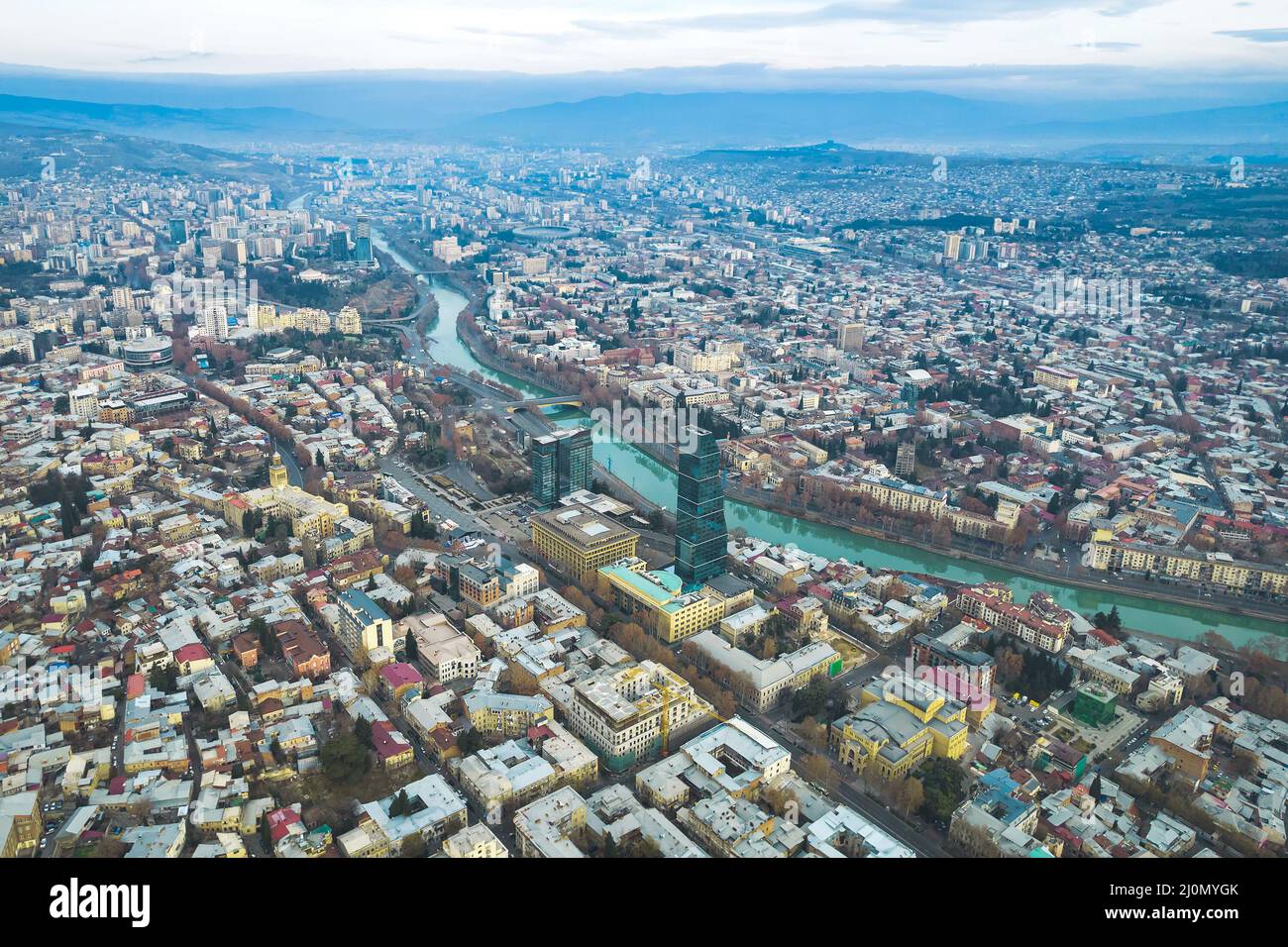 Aerial view of Tbilisi city center with churches and modern buildings ...