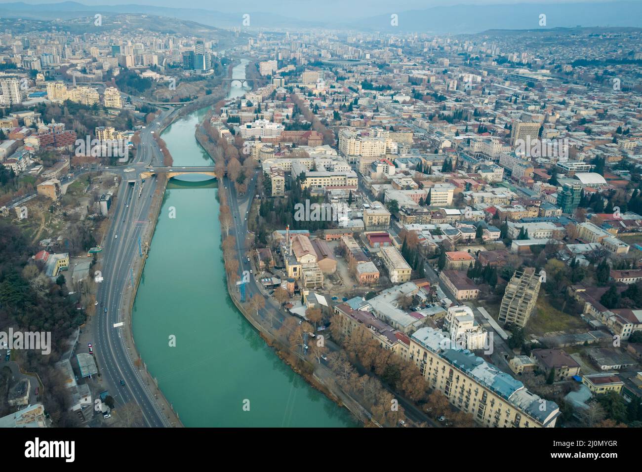 Aerial view of Tbilisi city center with churches and modern buildings ...