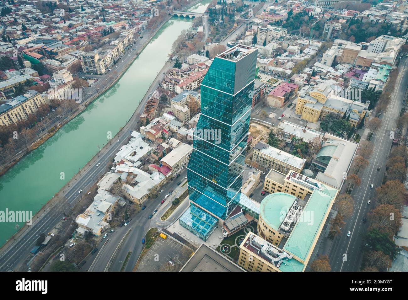 Aerial view of Tbilisi city center with churches and modern buildings ...