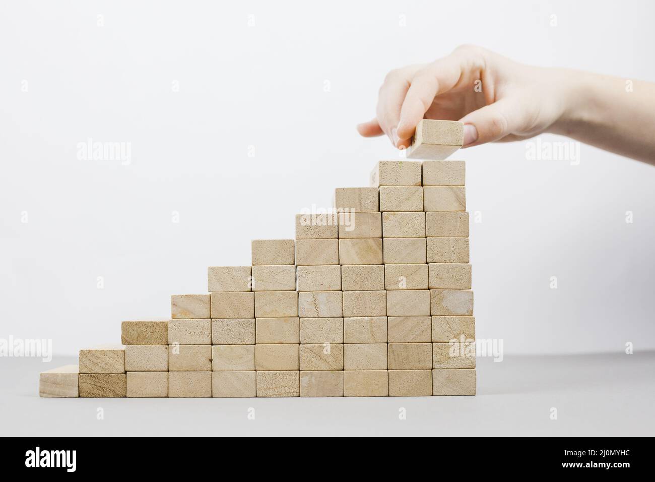 Business concept with wood blocks Stock Photo - Alamy