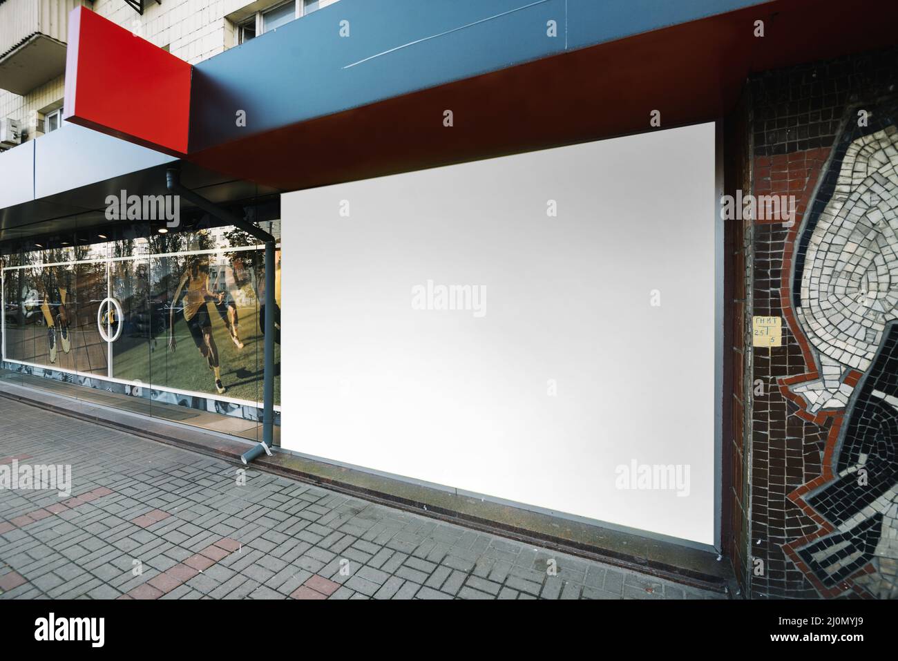 Advertising panel building Stock Photo - Alamy