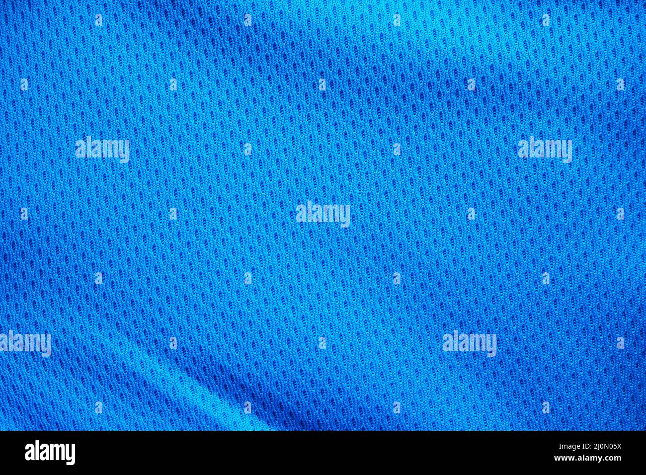Blue fabric sport clothing football jersey with air mesh texture ...