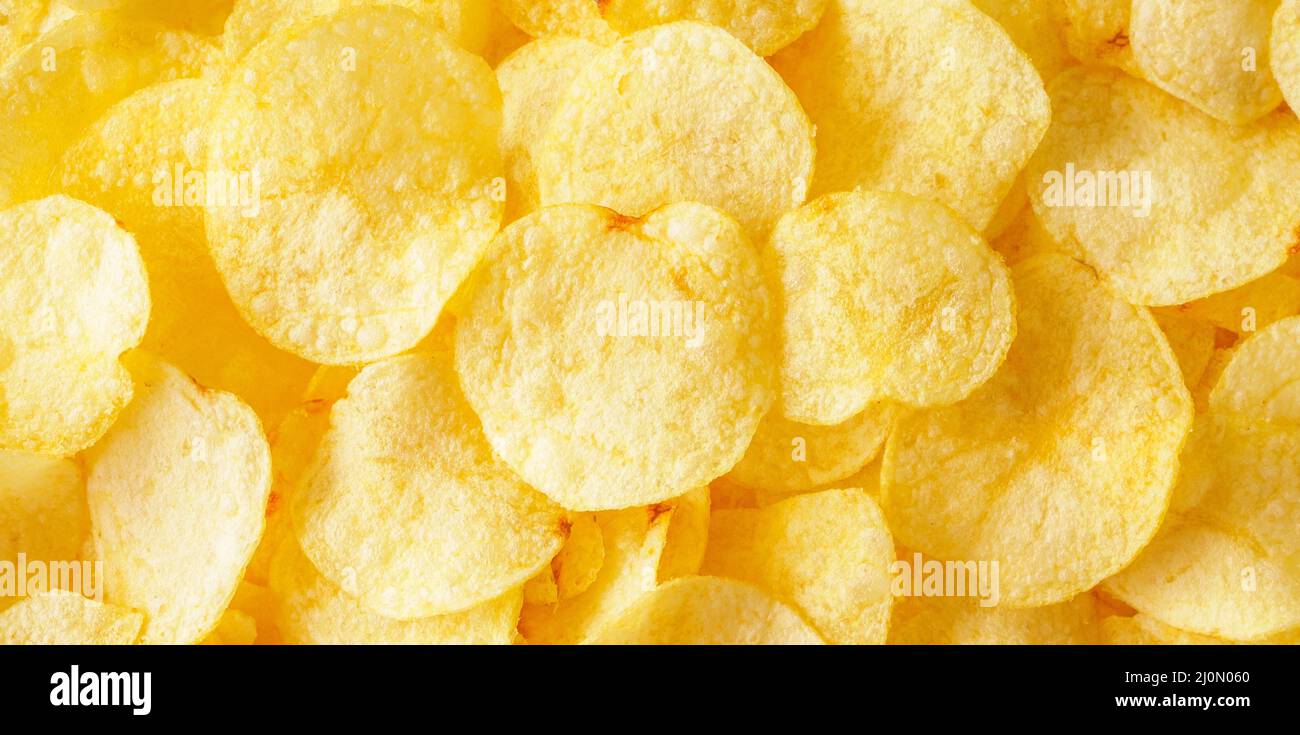 crispy potato chips snack texture background Stock Photo - Alamy
