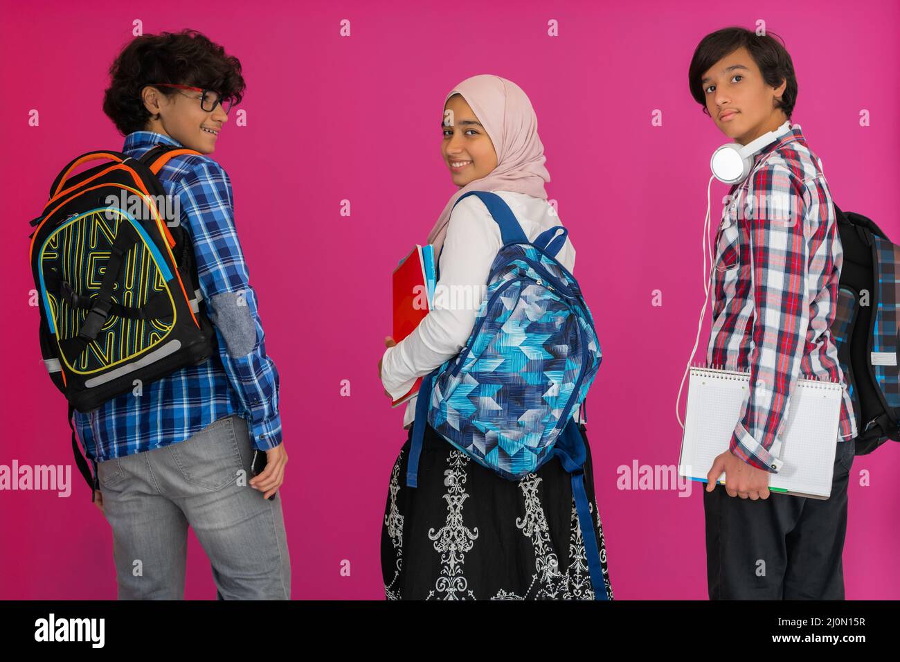 A group of Arab teenagers, a student team walking forward into the ...