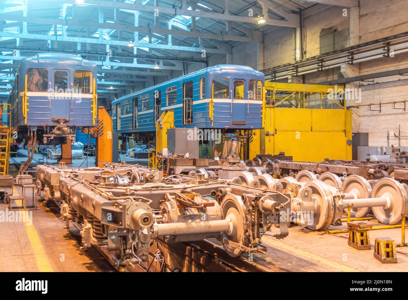 Electric depot of trains, wagons are installed on jacks. Procedure for ...