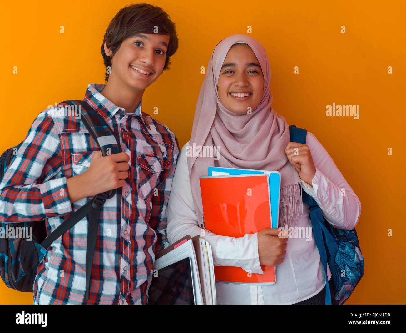 A group of Arab teenagers, a student team walking forward into the ...