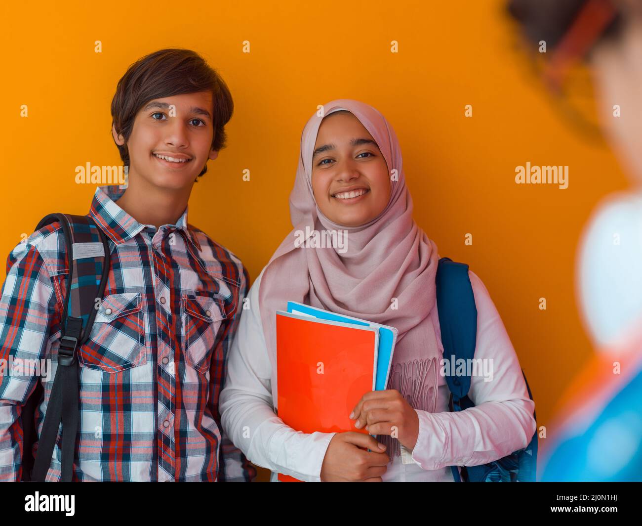 A group of Arab teenagers, a student team walking forward into the ...