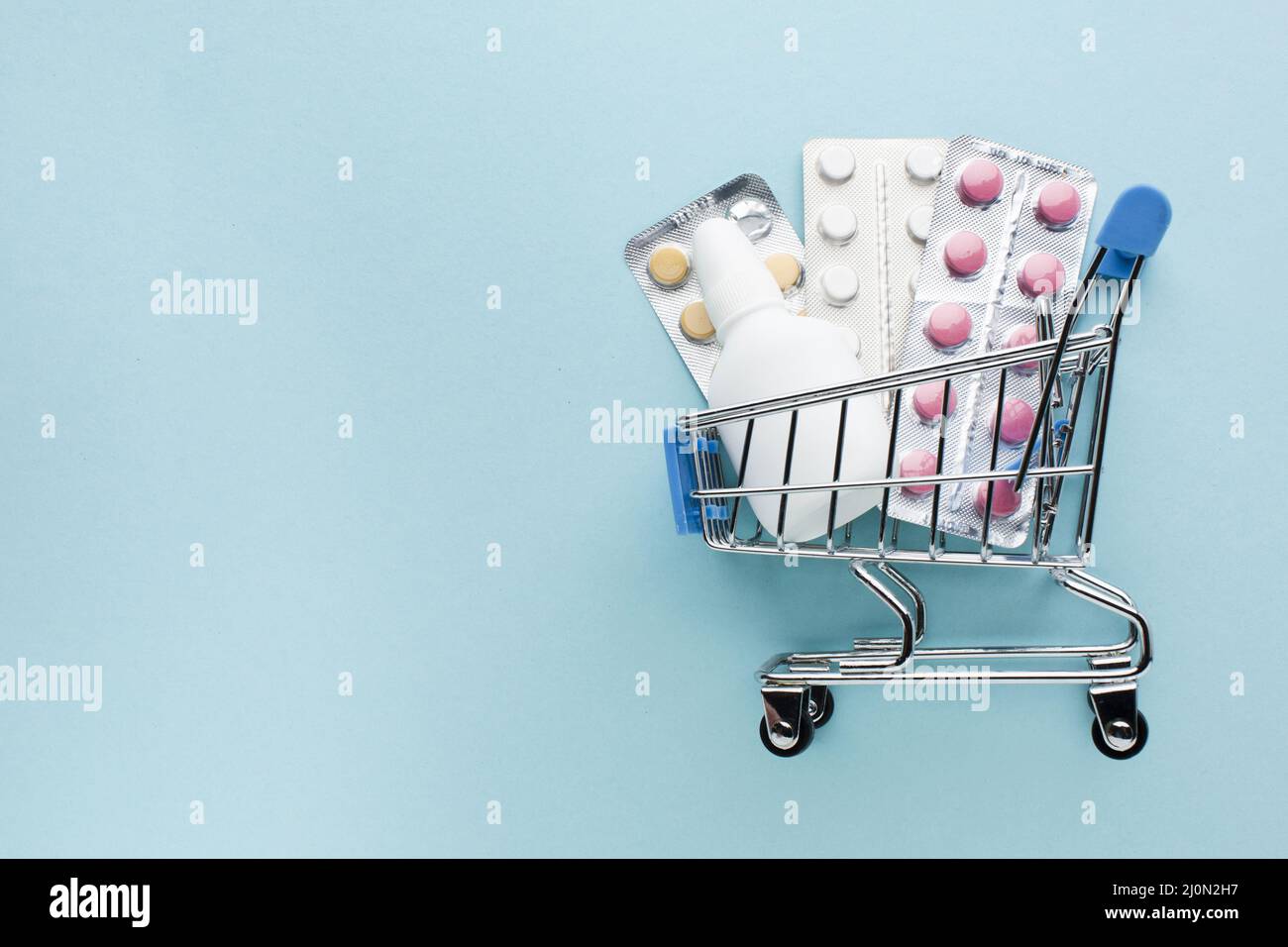Buying medical supplies with shopping cart concept Stock Photo - Alamy
