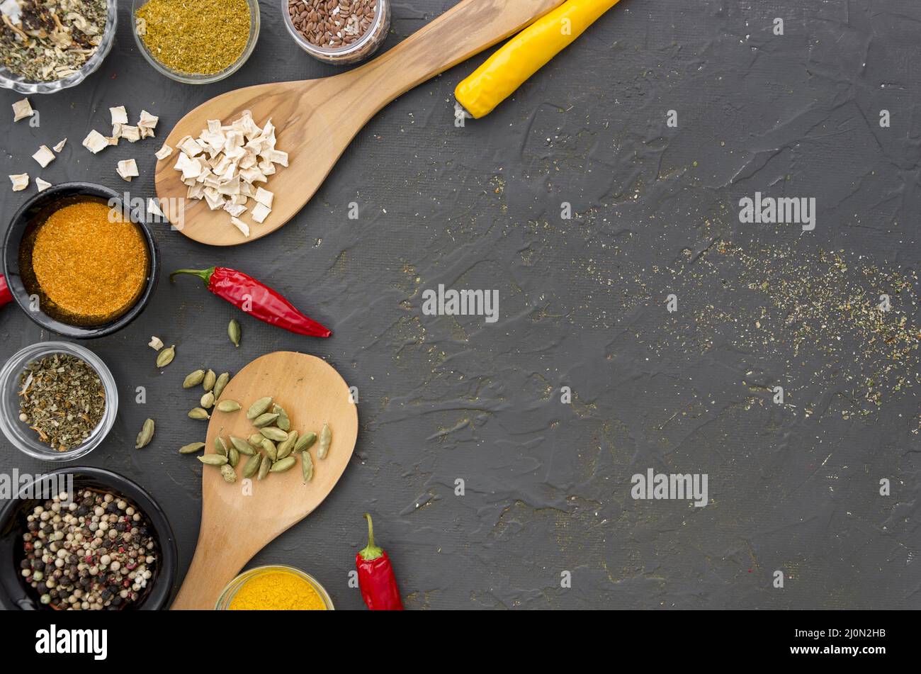 Assortment spices herbs grey copy space background Stock Photo - Alamy