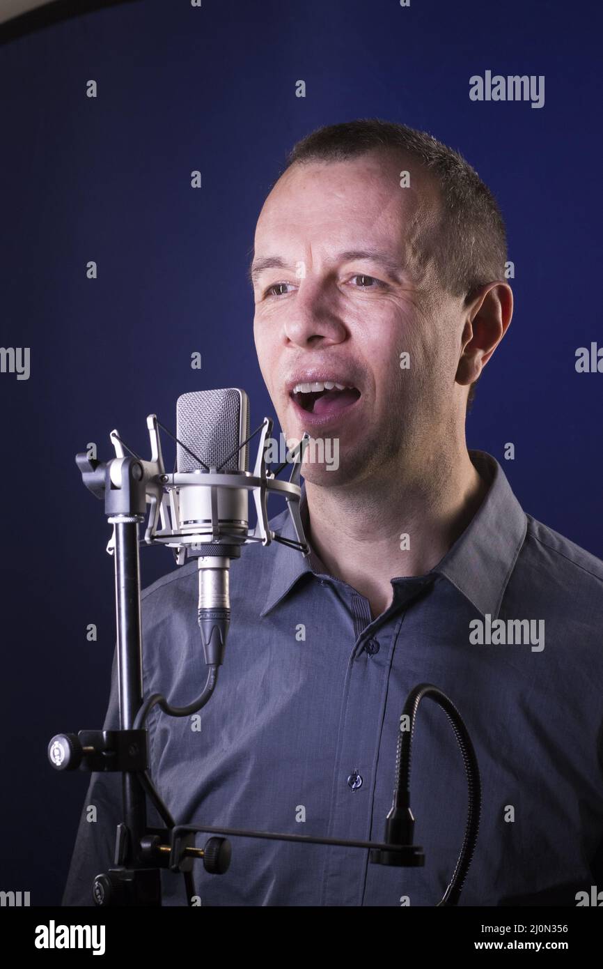 Voiceover artist voice actor studio Stock Photo - Alamy